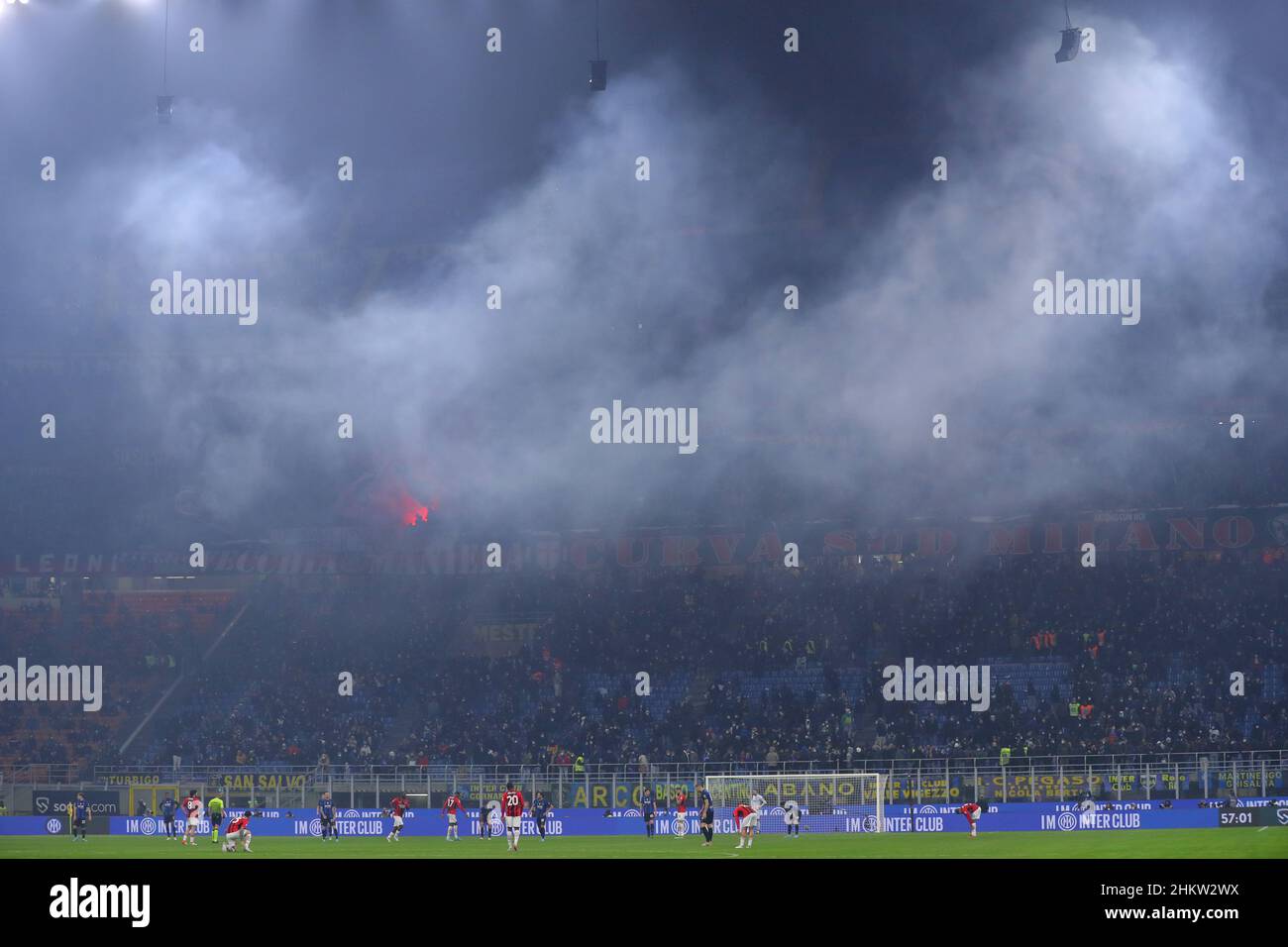 Milan, Italy, 5th February 2022. Smoke drifts across the pitch in this ...