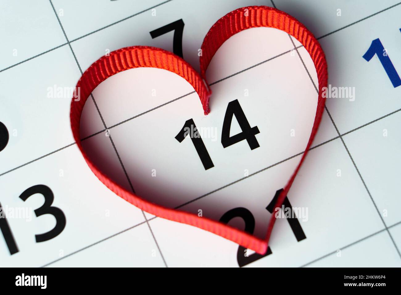 Date of February 14 on the calendar, Valentines Day red heart made of ...