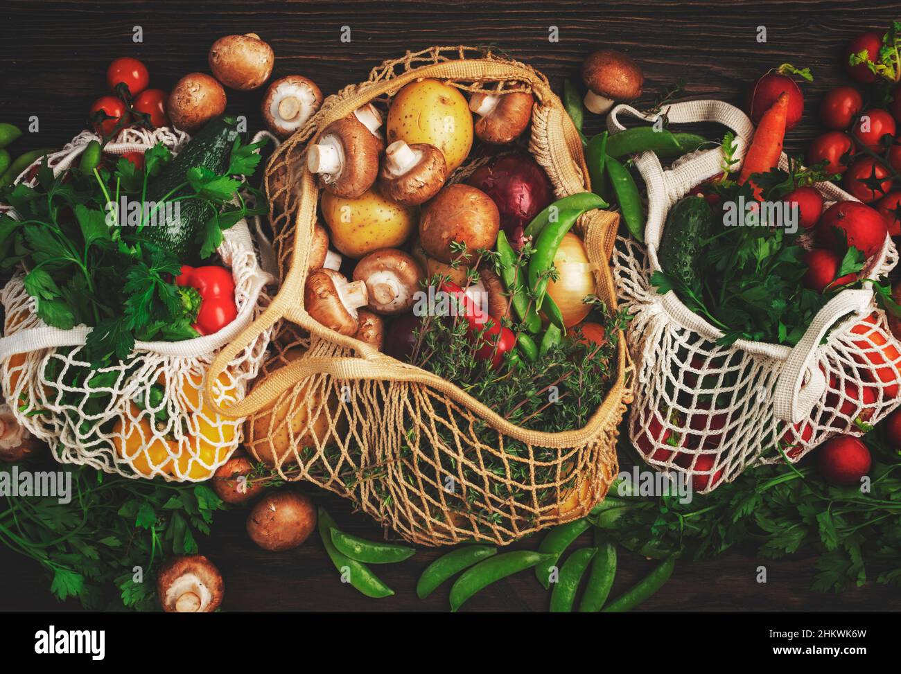 Reusable shopping textile bags full of organic spring vegetables from ...