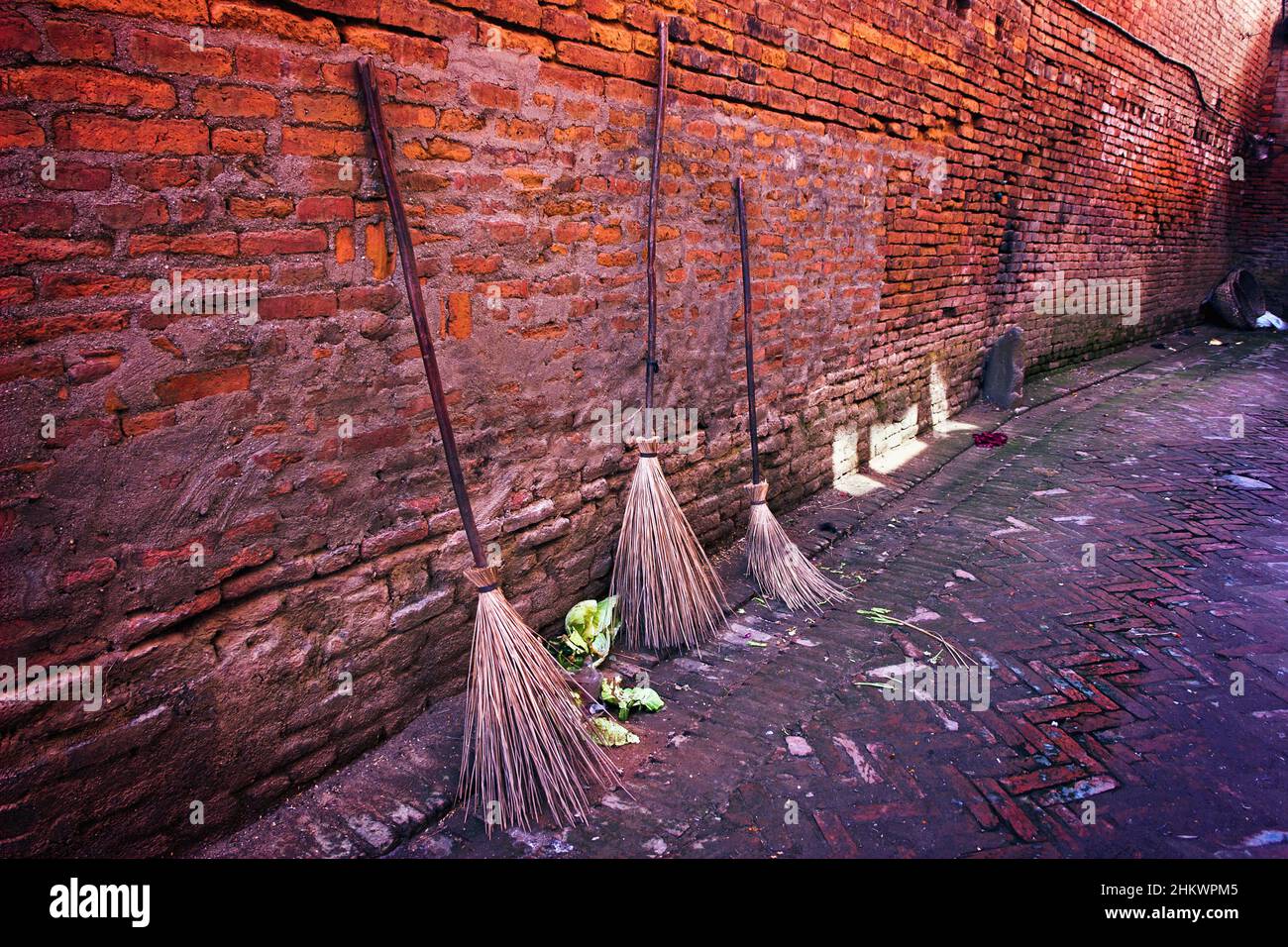 Broom leaning on wall hi-res stock photography and images - Alamy