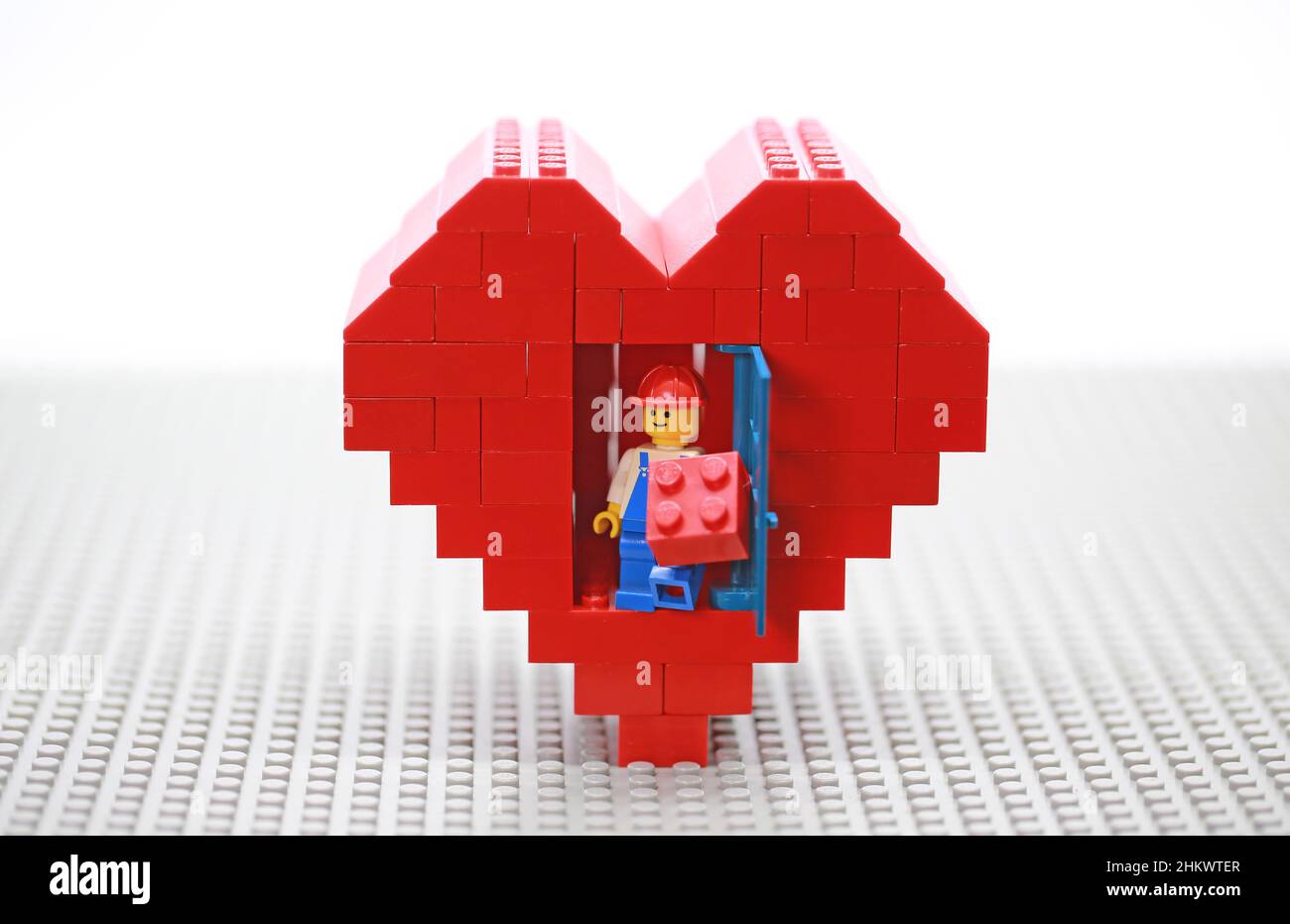 the workers try to rebuild the heart-shaped block Stock Photo - Alamy