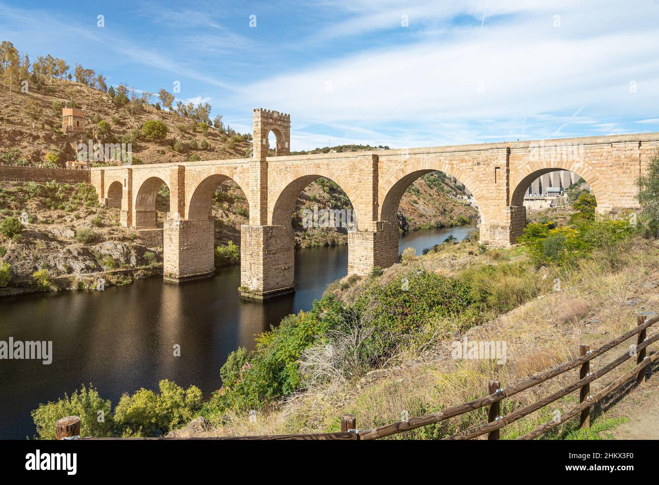 Stone old bridge over river in summertime Stock Photo - Alamy