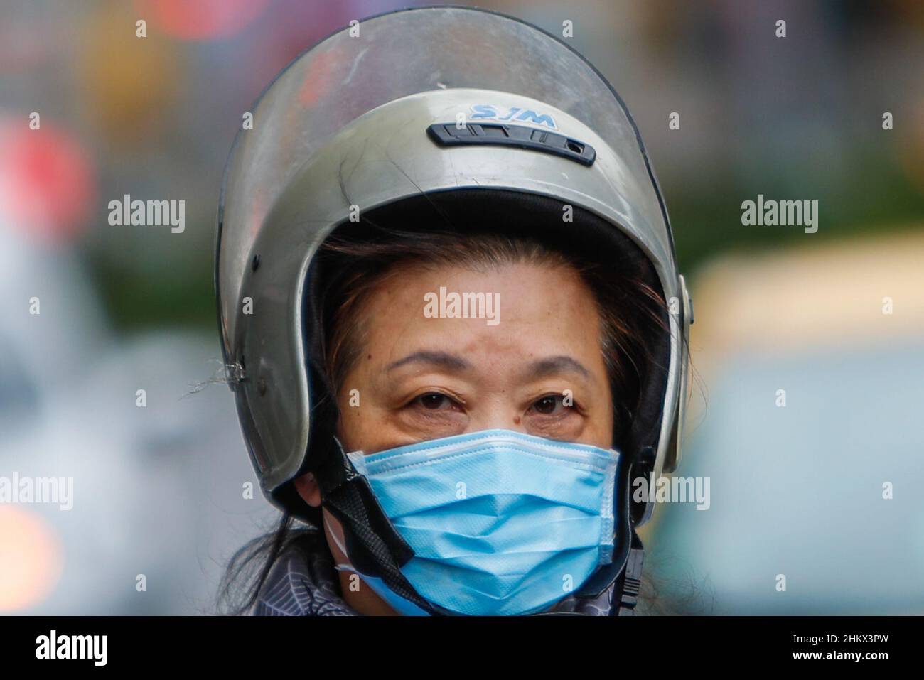Taipei, Taipei, Taiwan. 6th Feb, 2022. A female motorcyclist with a ...