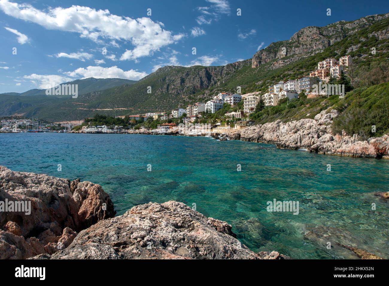 The rugged coastline of the Turkish fishing village of Kas. It lies on ...