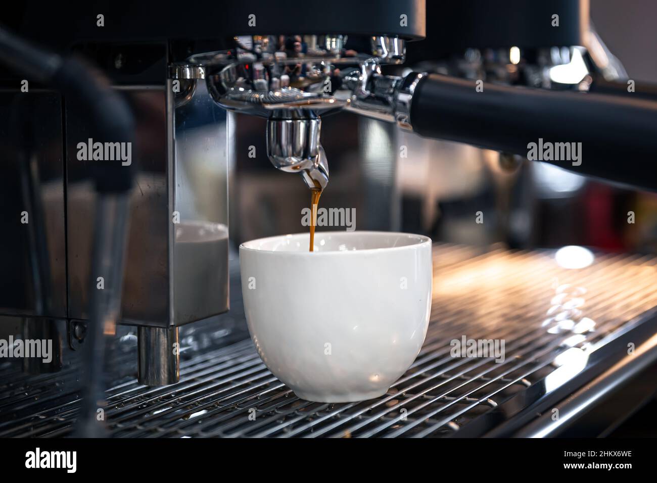 The process of preparing espresso in a professional coffee machine ...