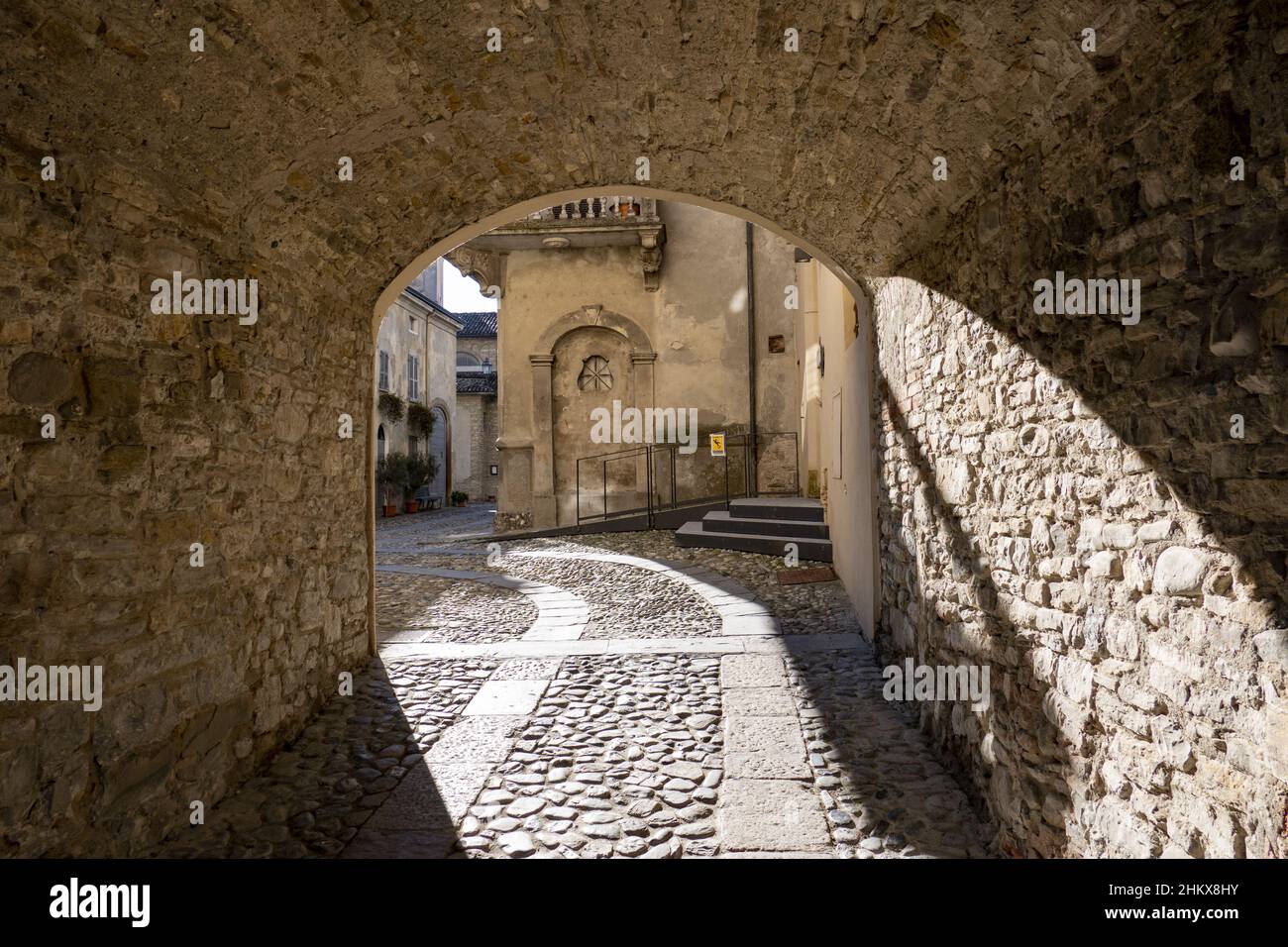 Old architecture and footpath of Travo, Piacenza, Italy on a sunny day ...
