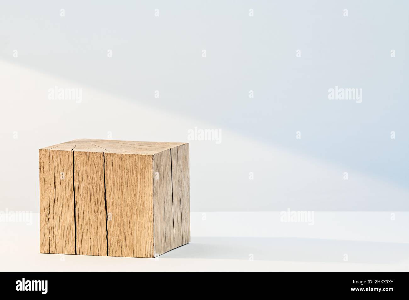 Oak cube on a white background. Organic natural podium Stock Photo - Alamy