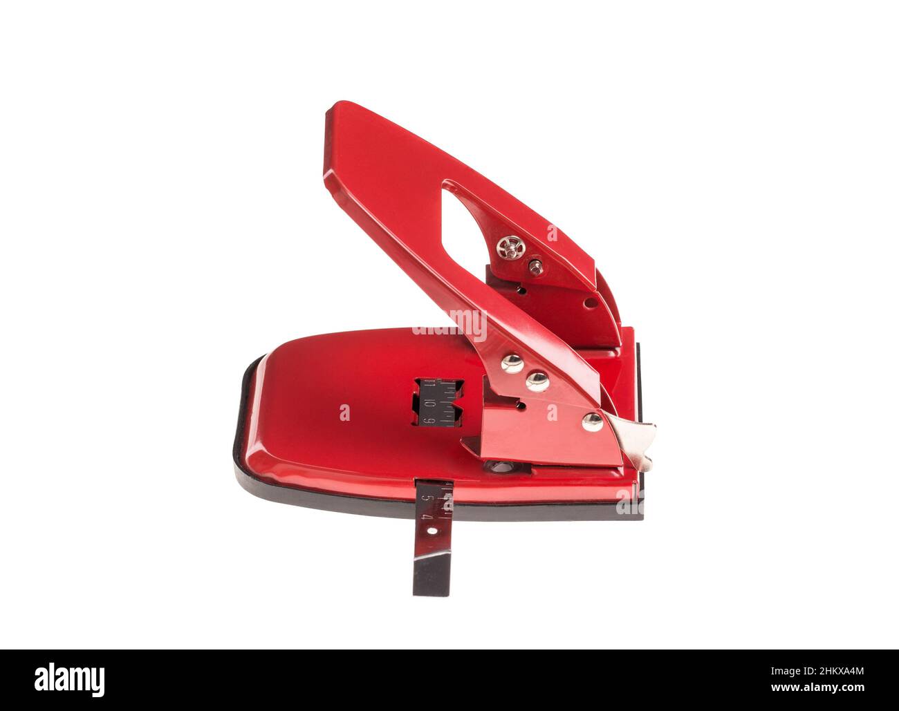 Red office hole puncher. Isolated on a white background Stock Photo - Alamy
