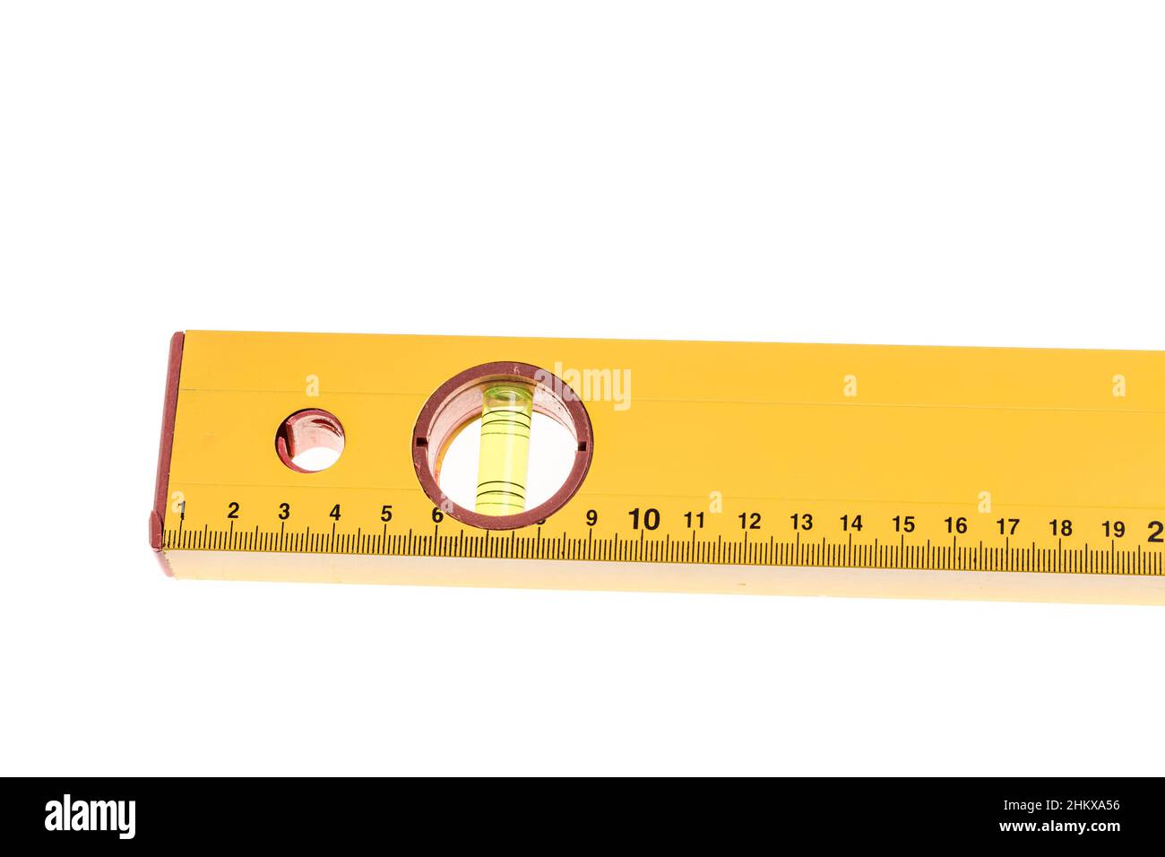 Yellow block level meter with bubble. Isolated on a white background ...