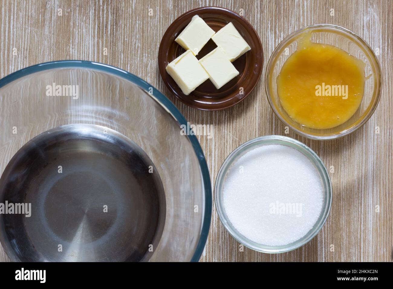 Ingredients for honey cake: honey, butter, sugar before cooking on bain ...