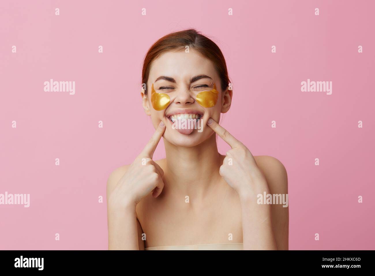 portrait woman patches rejuvenation skin care fun after shower close-up ...