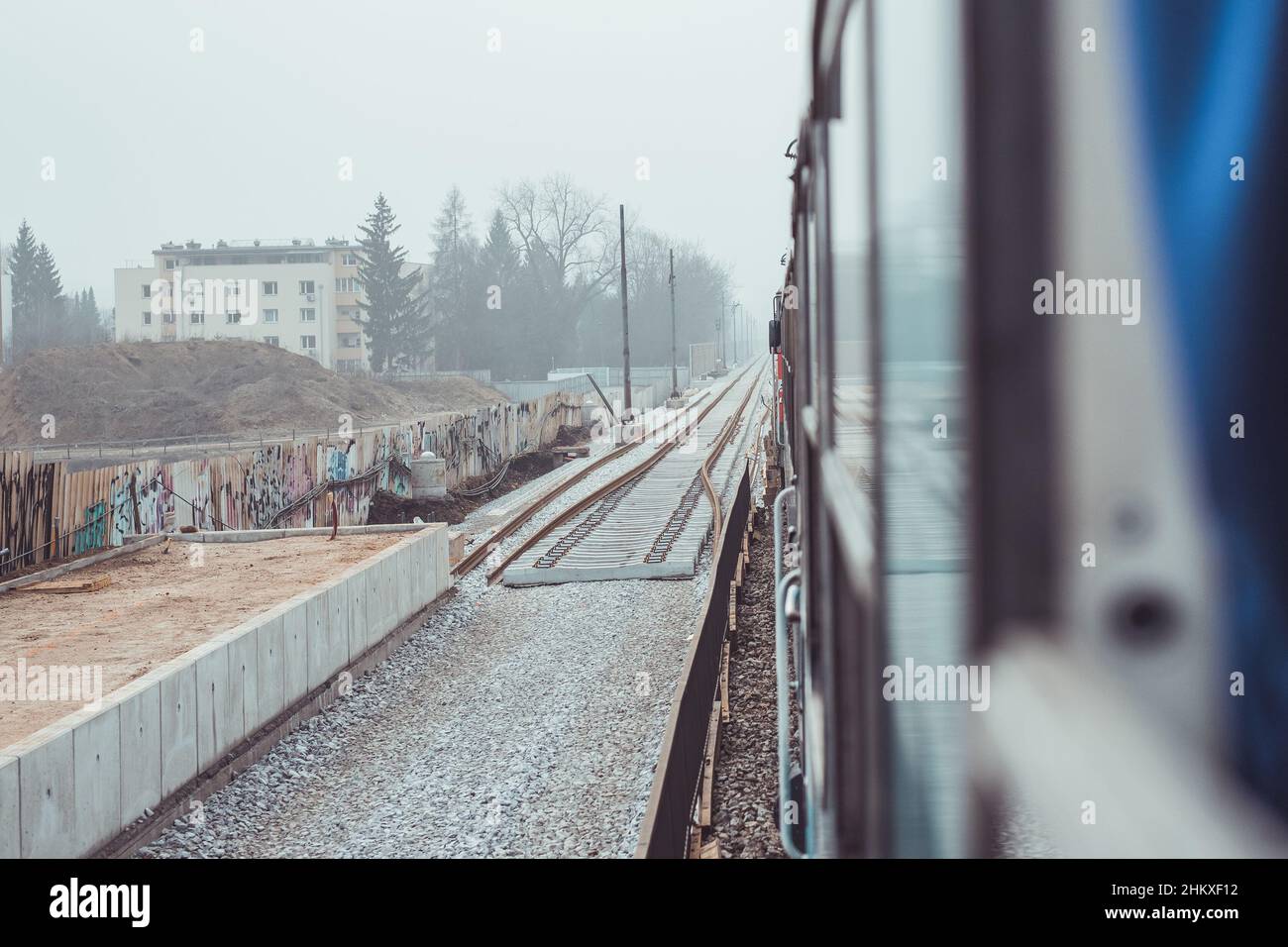 Train track construction, fresh concrete sleepers and track surface ...