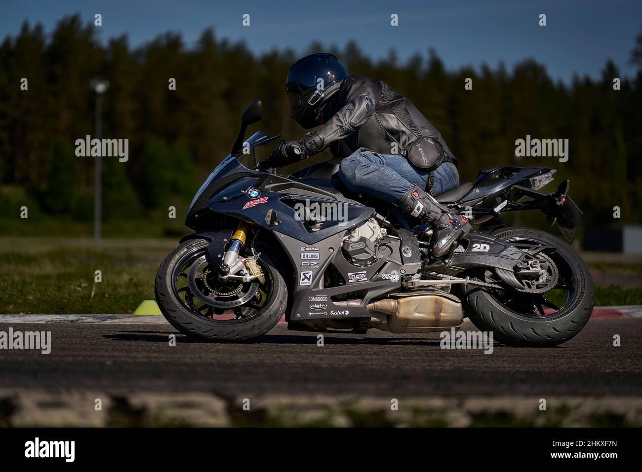 11-05-2021 Riga, Latvia Motorcyclist at sport bike rides by empty ...