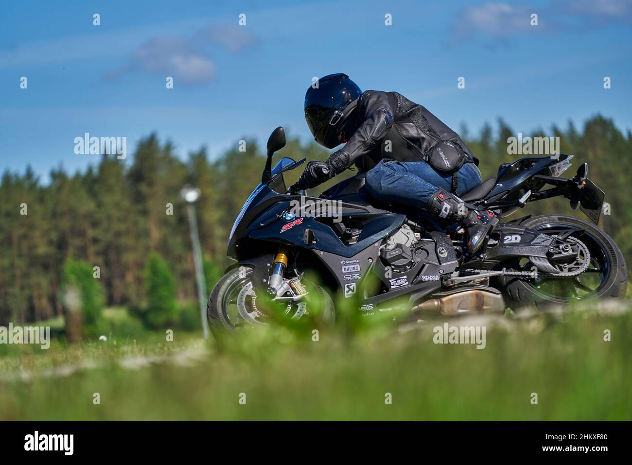 11-05-2021 Riga, Latvia Motorcyclist at sport bike rides by empty ...