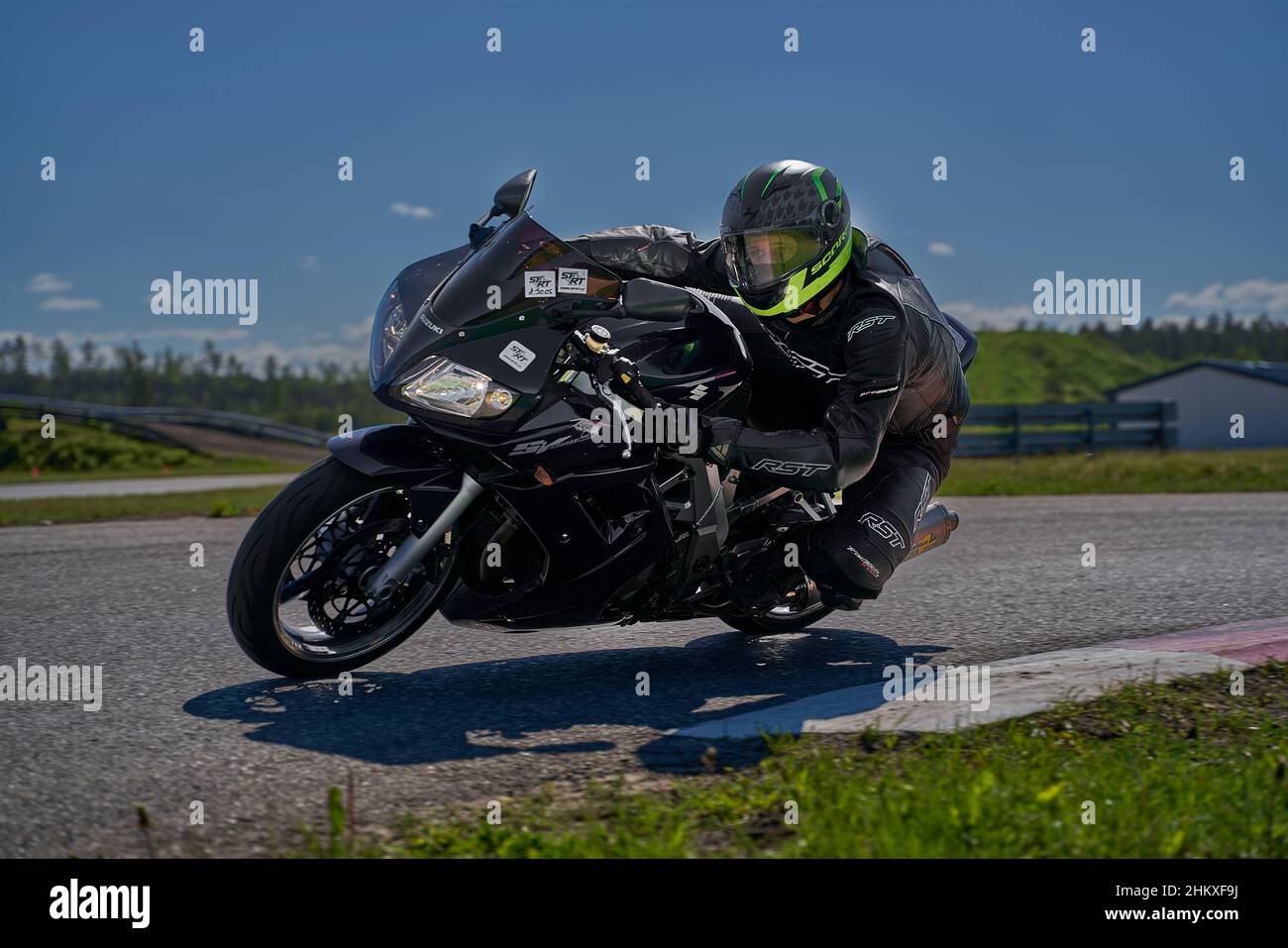 11-05-2021 Riga, Latvia Motorcyclist at sport bike rides by empty ...