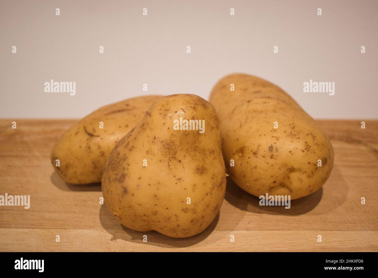 Three potatoes which hi-res stock photography and images - Alamy