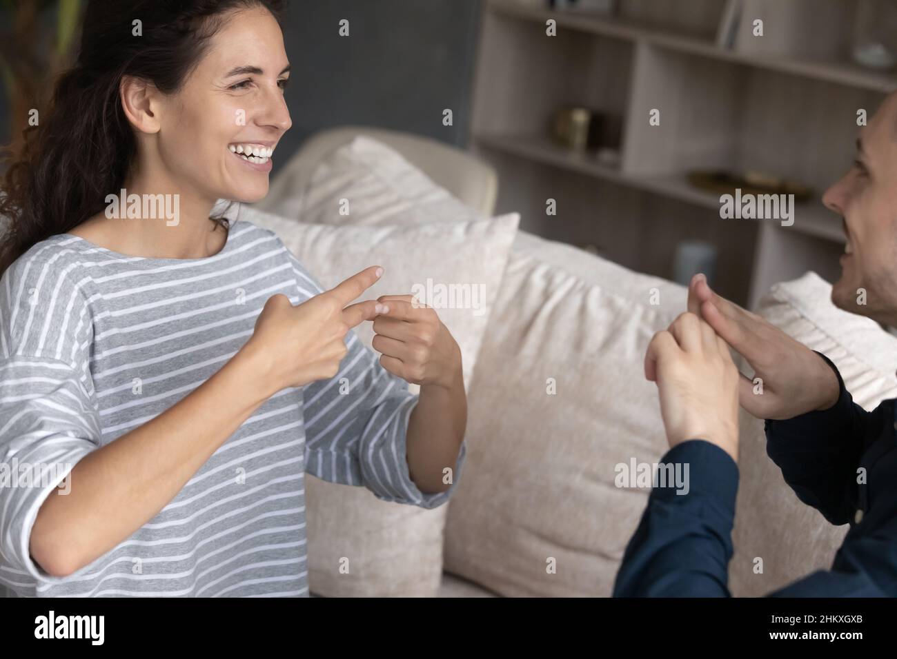 Hispanic family sign language hi-res stock photography and images - Alamy