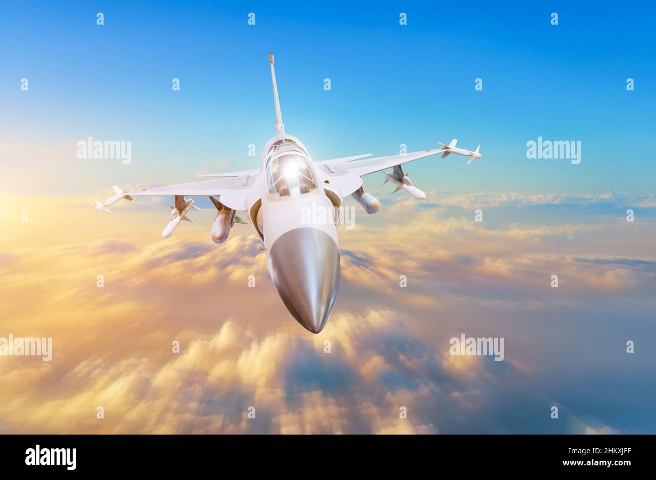 Military fighter aircraft at high speed, flying high in the sky sunset ...