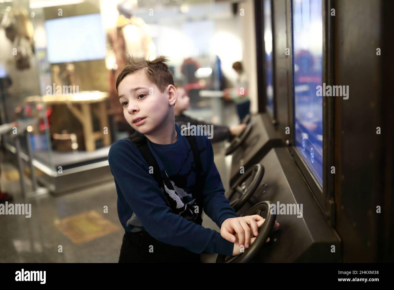 Boy playing car simulator hi-res stock photography and images - Alamy