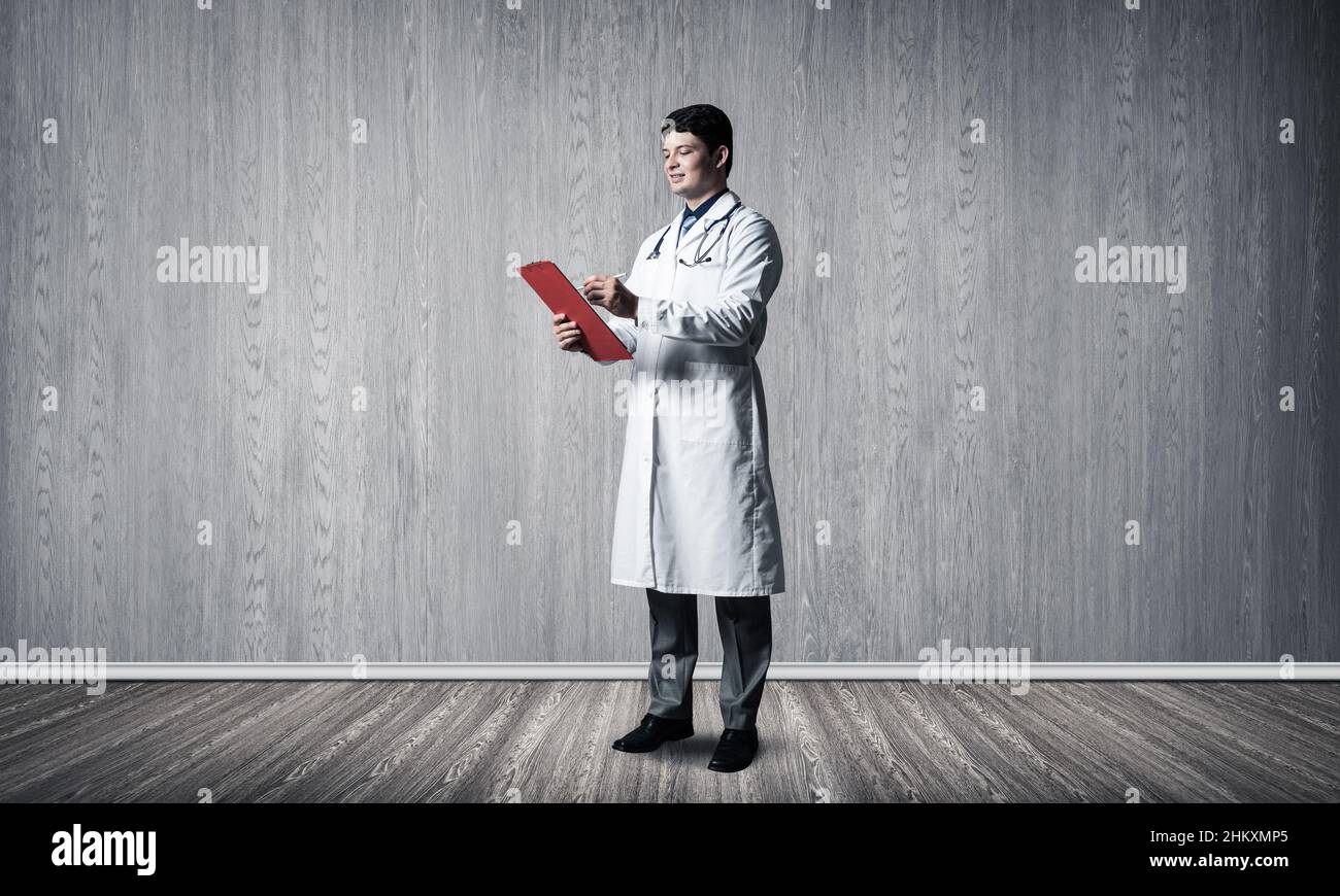 Doctor with tablet Stock Photo - Alamy