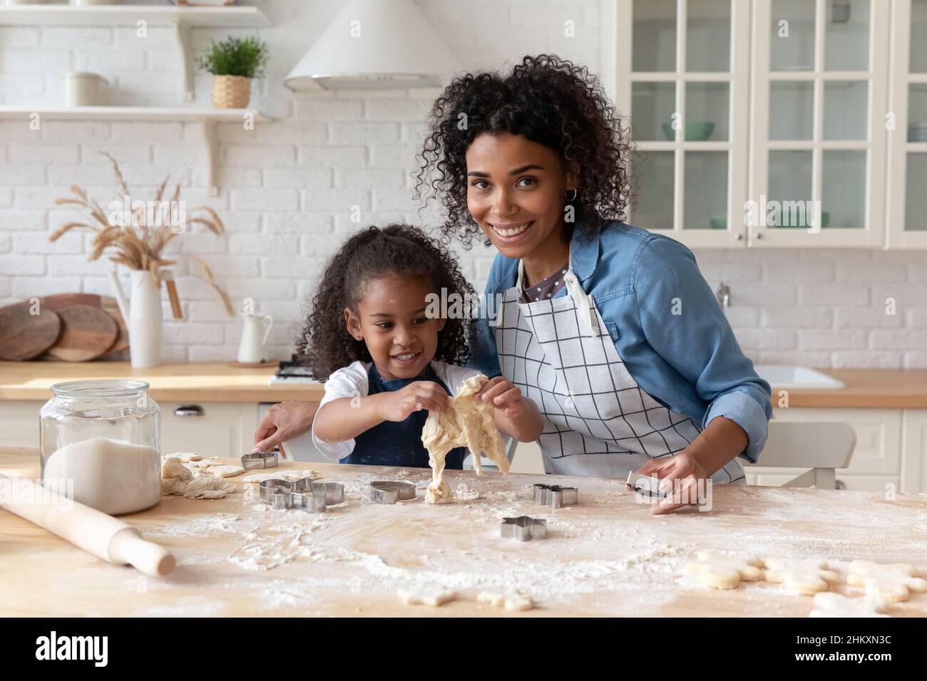 Portrait of happy African American family cooking at home Stock Photo ...