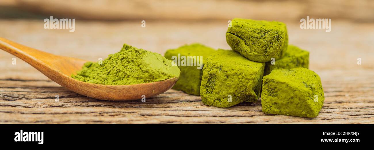 Matcha powder and candy made of matcha on wooden background. Homemade ...