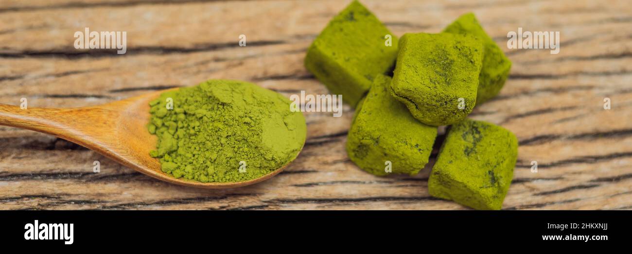 Matcha powder and candy made of matcha on wooden background. Homemade ...