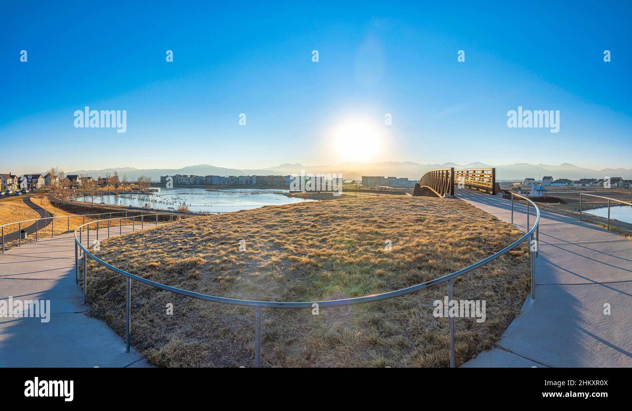 Curved pathway metal barriers near the bridge over the Oquirrh lake at ...