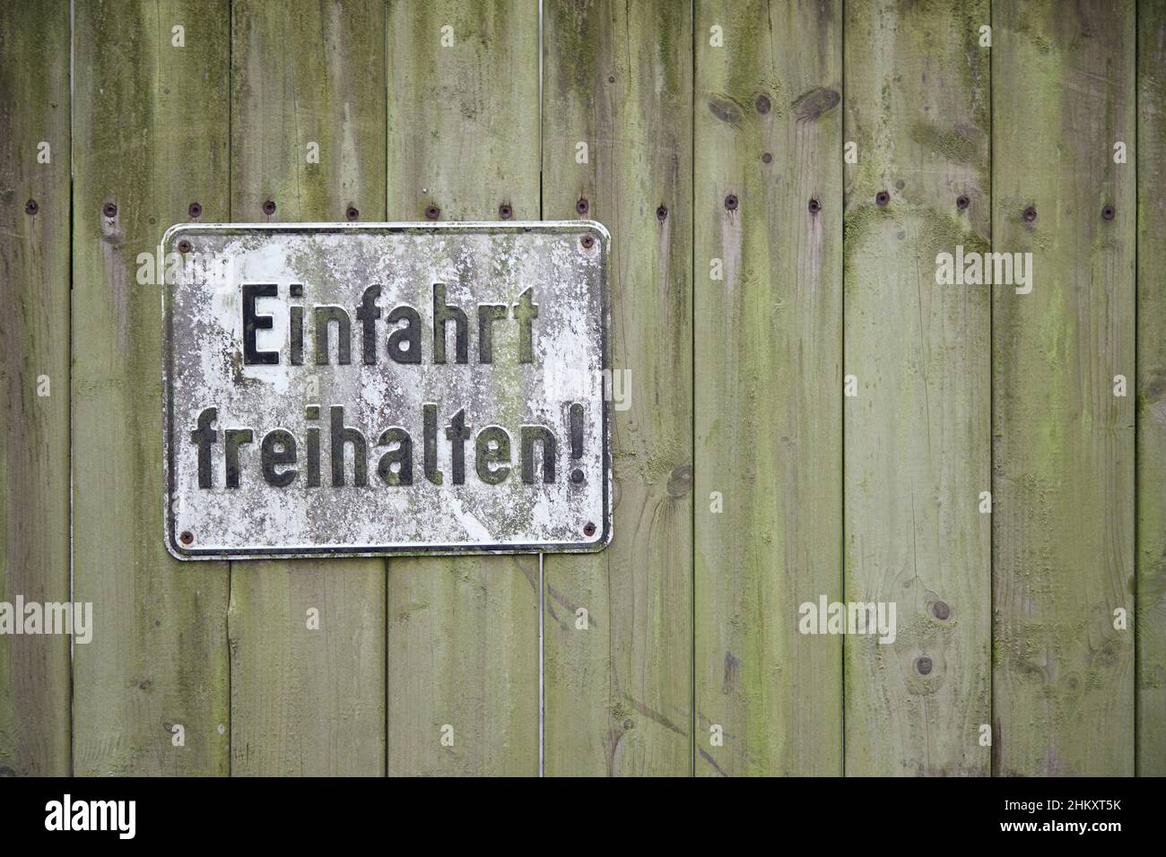 german sign with the words keep entrance free, that means no parking in ...