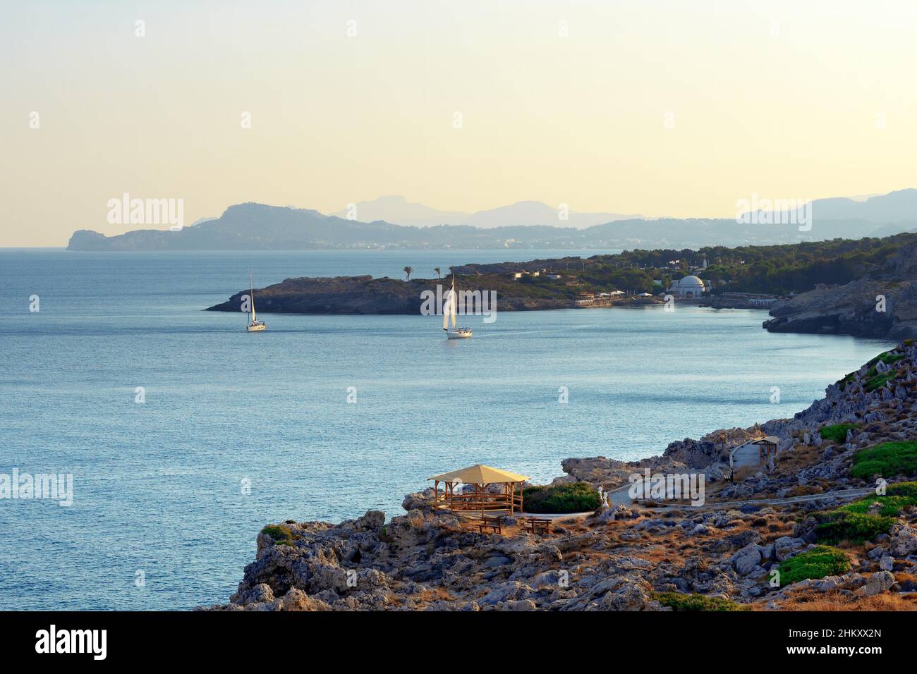 View on Kalithea Springs Bay in far distance and yachts anchored in the ...