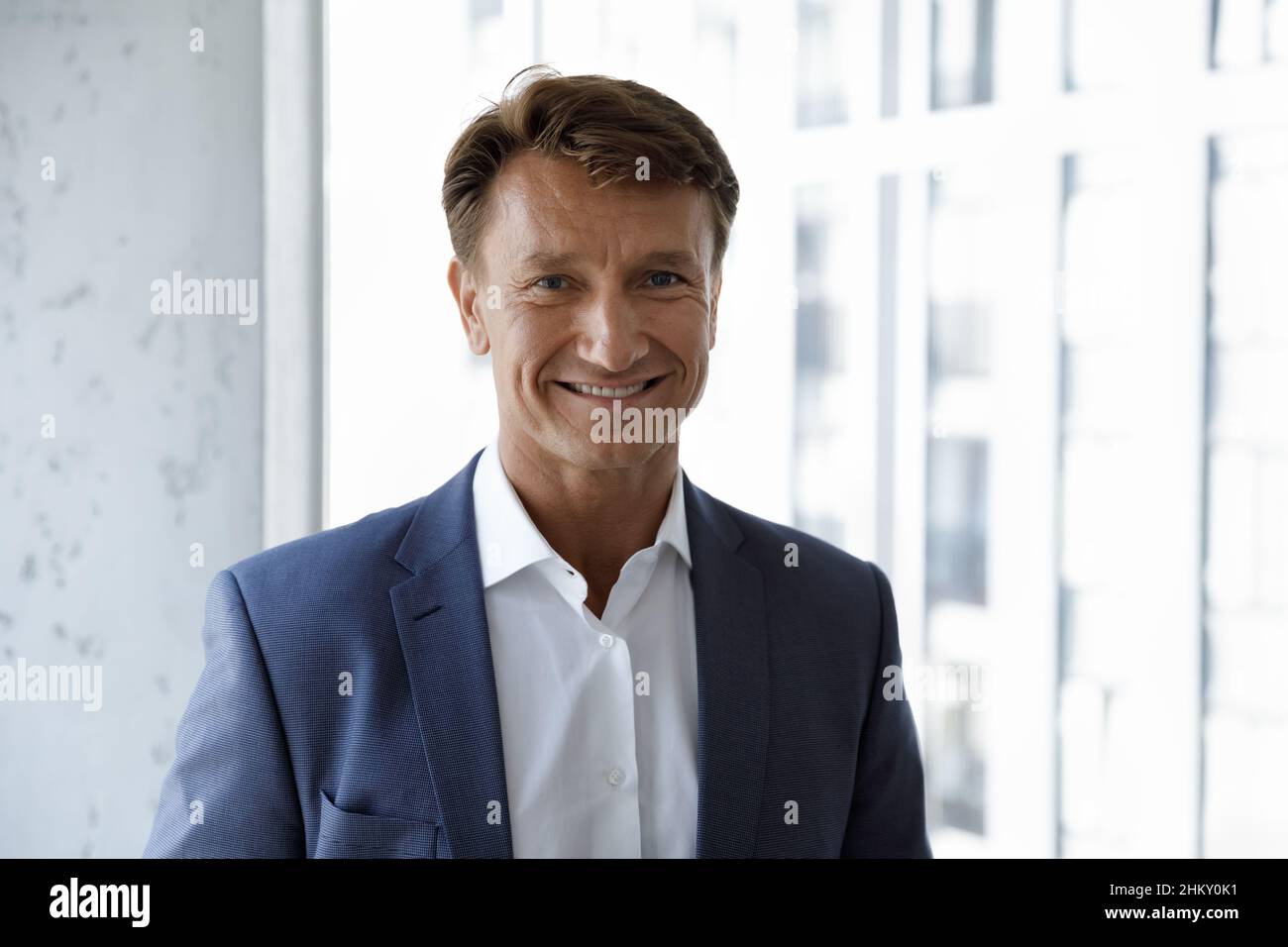 Happy mature male business leader head shot portrait Stock Photo - Alamy