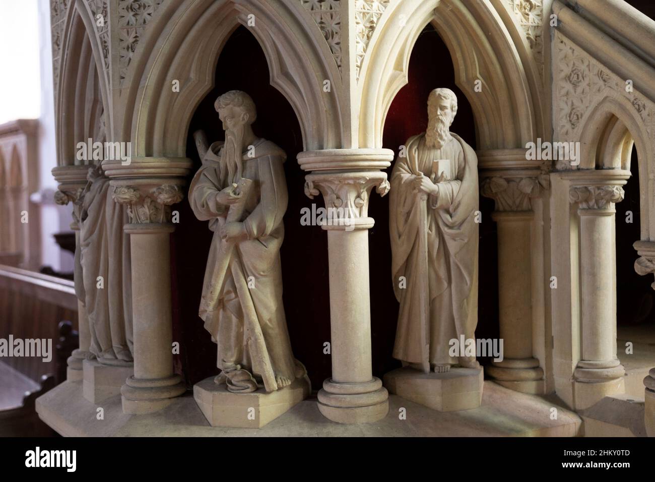 Close up detail of carved figures of Apostles in pulpit, Brome church ...