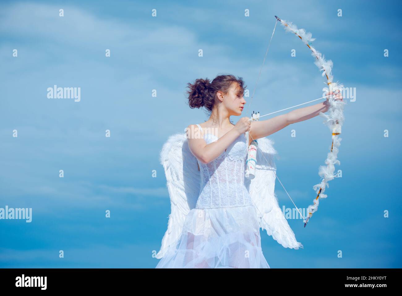 Girl aiming arrow sky hi-res stock photography and images - Alamy