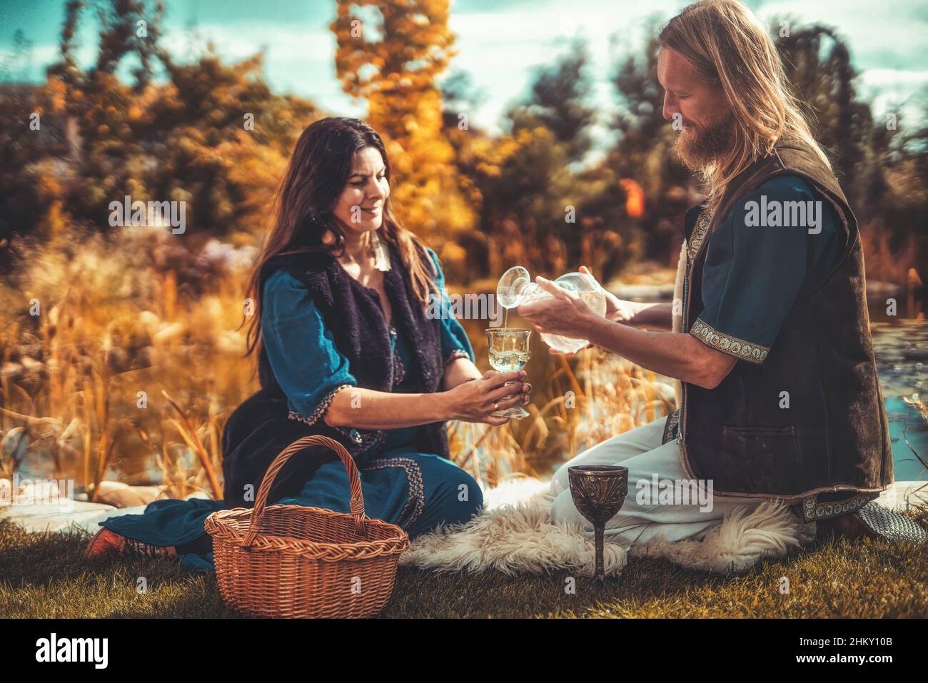 medieval man with beautiful medieval woman on a picnic Stock Photo - Alamy