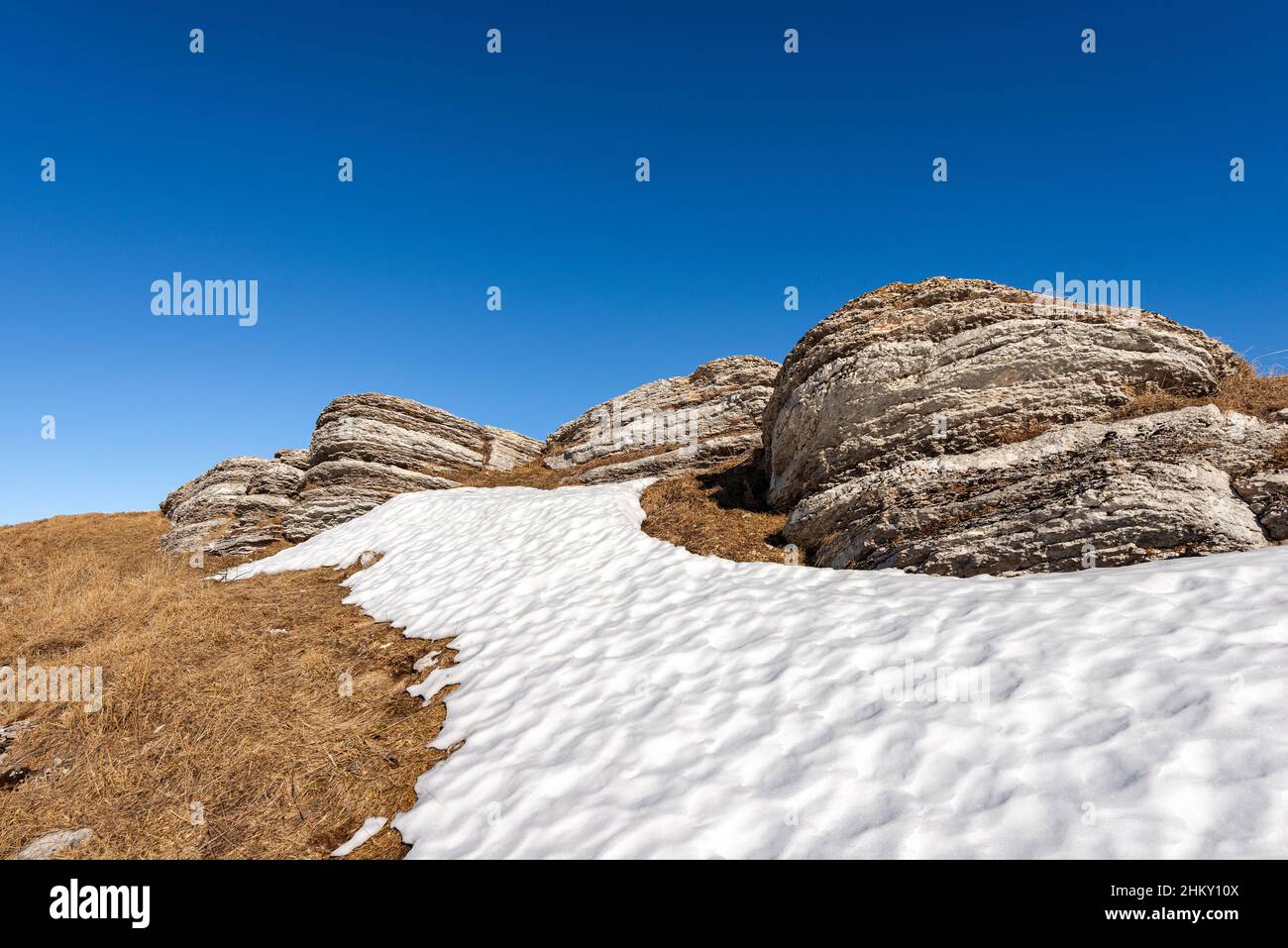 Rock karst formations on clear blue sky in Lessinia Plateau Regional ...