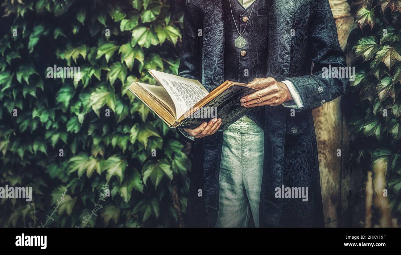 Alchemist in a beautiful ornamental dress in nature Stock Photo - Alamy