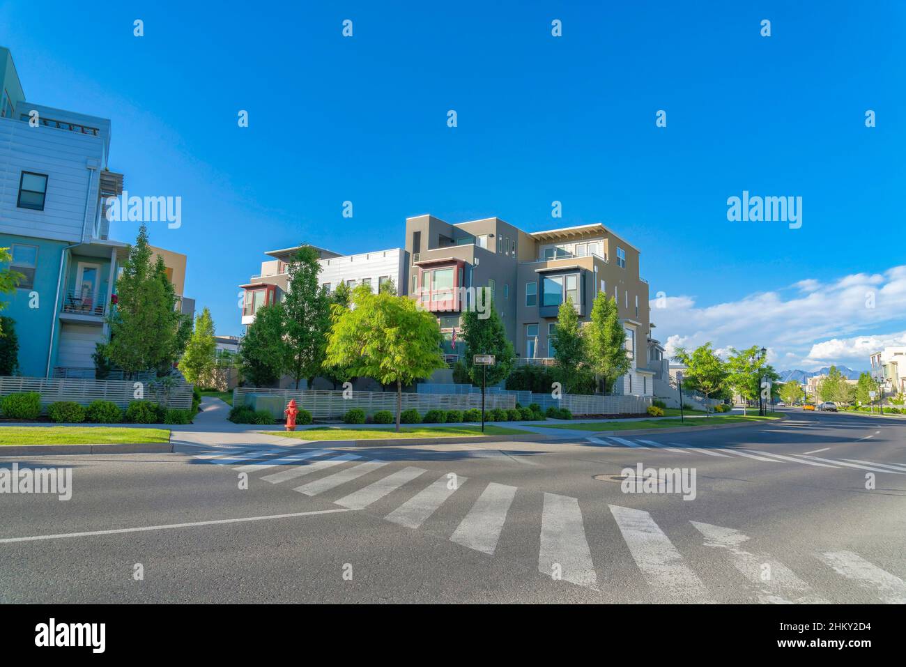 Slanted pedestrian lanes on the road at Daybreak in South Jordan, Utah ...