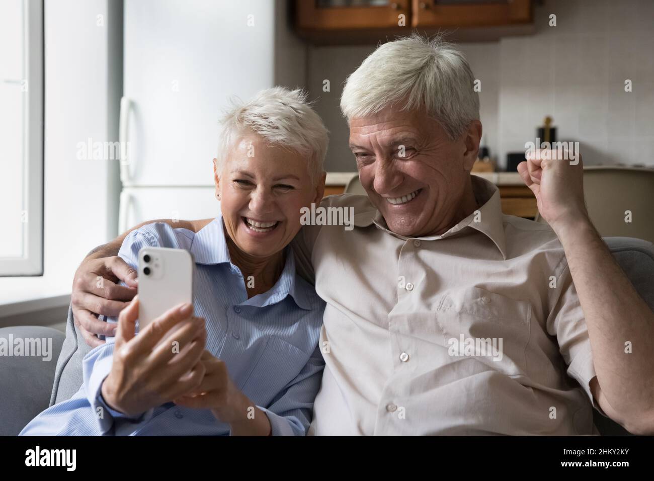 Happy woman surprising man hi-res stock photography and images - Alamy