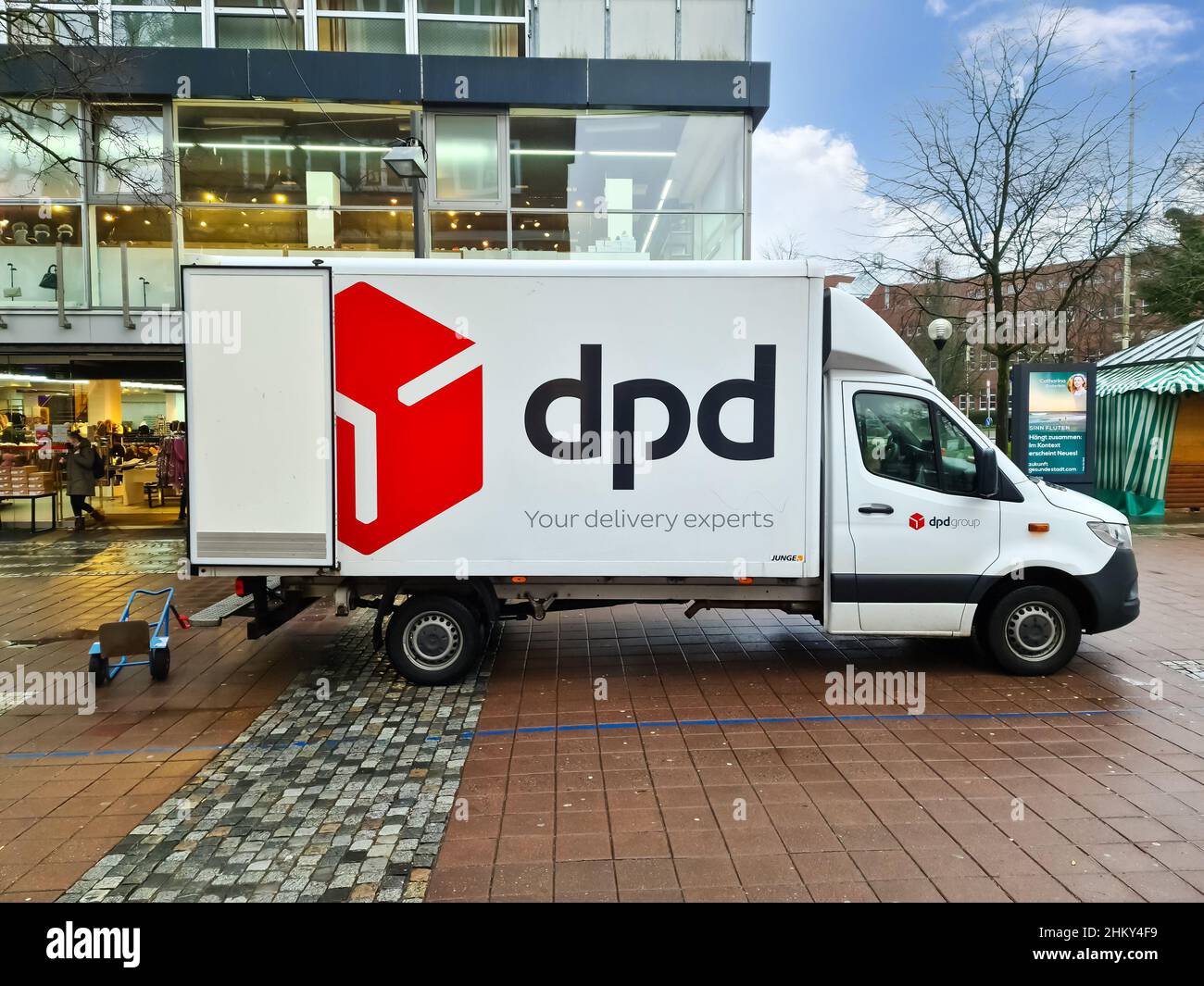 Small truck of the German parcel service DPD in Kiel's shopping street ...