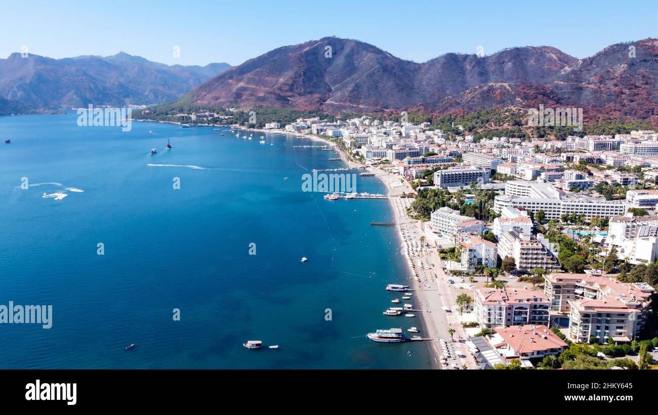 Aerial view of a Marmaris city in Turkey with crowded beach, sunny day ...