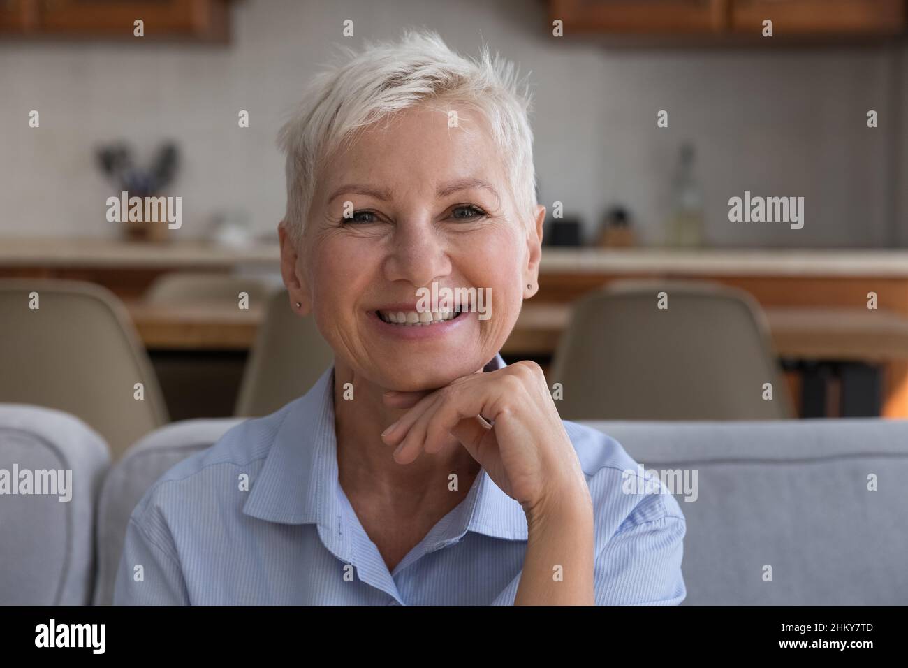 Happy stylish senior 60s woman home head shot portrait Stock Photo - Alamy