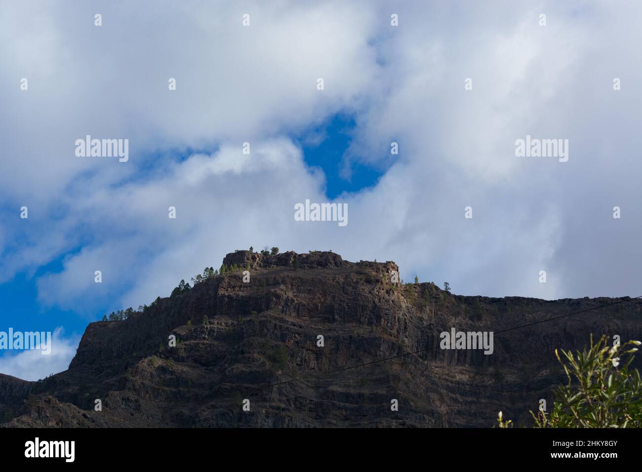 Mountains on the coast between Puerto de Mogan and Puerto Rico. Layers ...