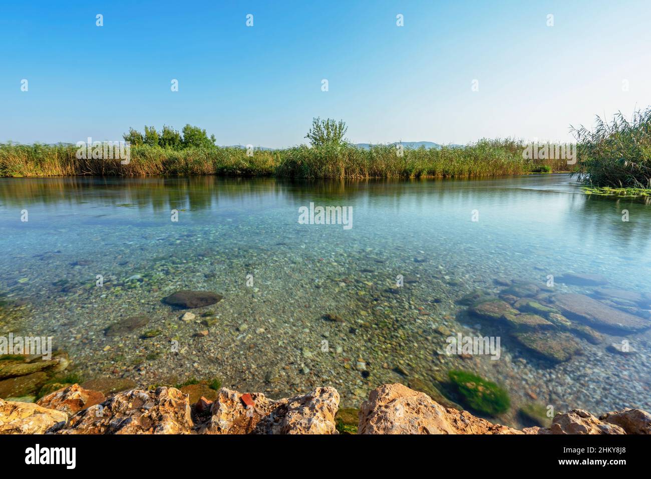 Crystal clear view of Azmak river in Akyaka. Akyaka (Gokova) is a ...