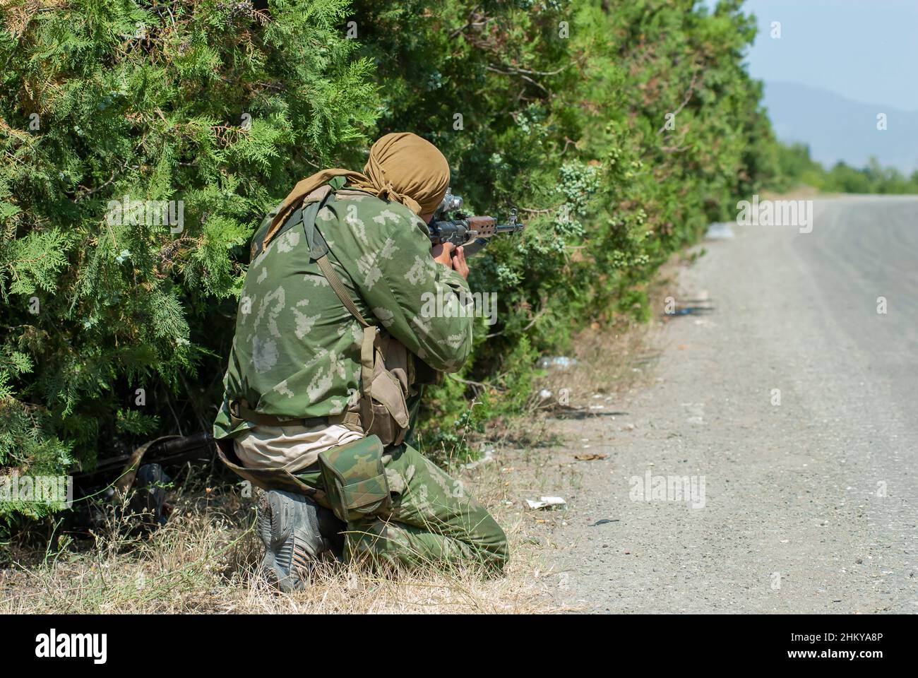 A Russian soldier shoots with Dragunov sniper rifle at Georgian ...