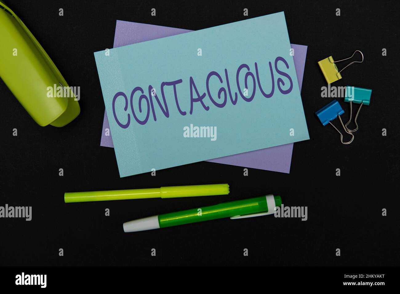 Text caption presenting Contagious. Concept meaning transmissible by ...