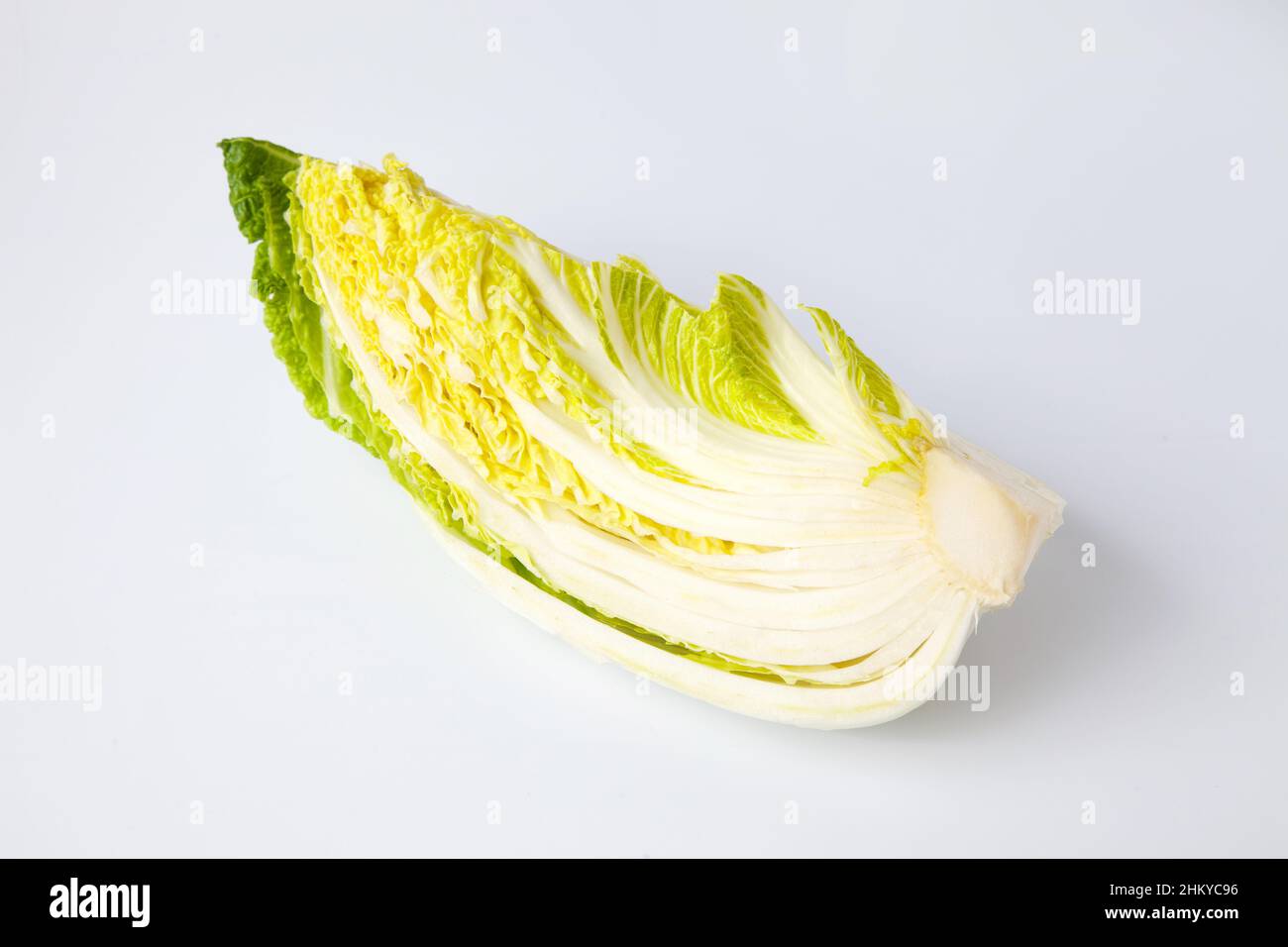 a quarter of Chinese cabbage cut isolated on white background Stock ...