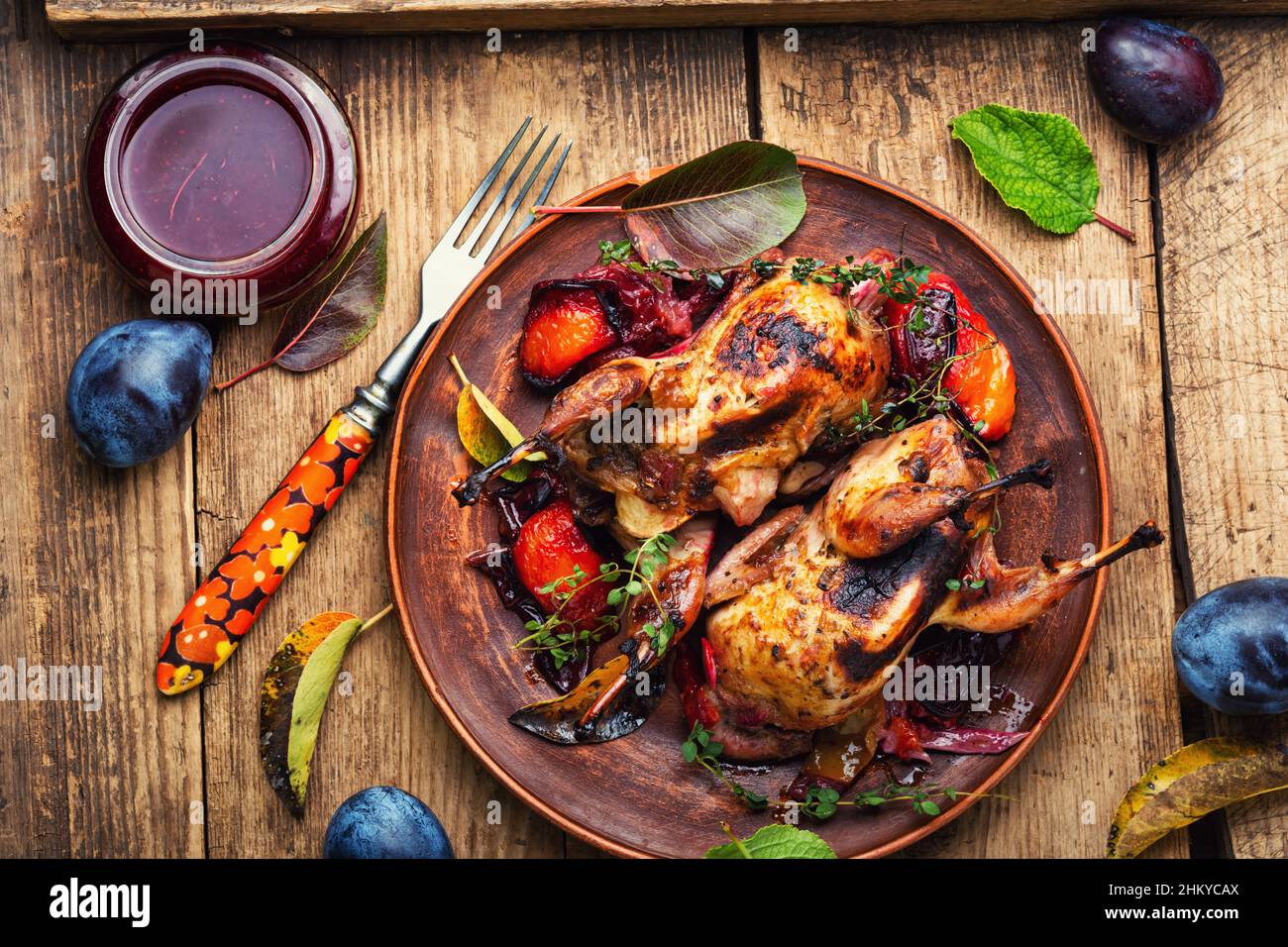 Juicy fried quail, dietary meat. Fried quail pickled in plum Stock ...