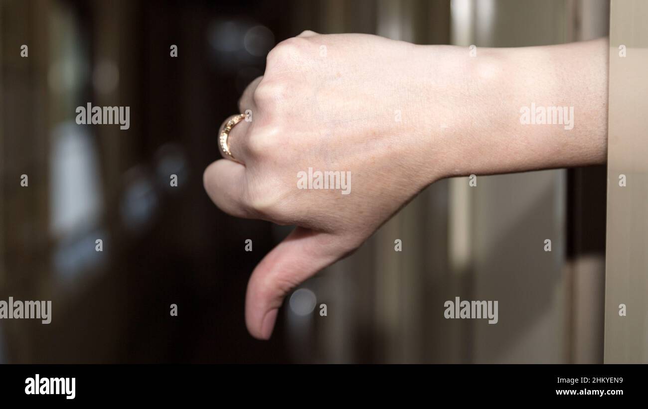 The human hand showing all bad down your finger down in the corridor ...