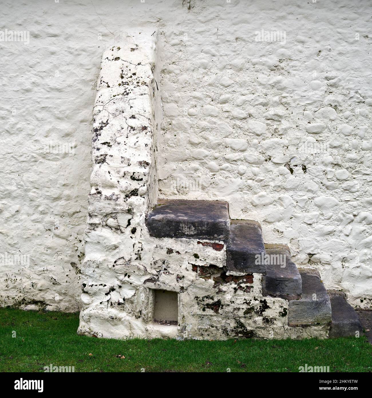 Steps to nowhere on wall of farmhouse Stock Photo - Alamy