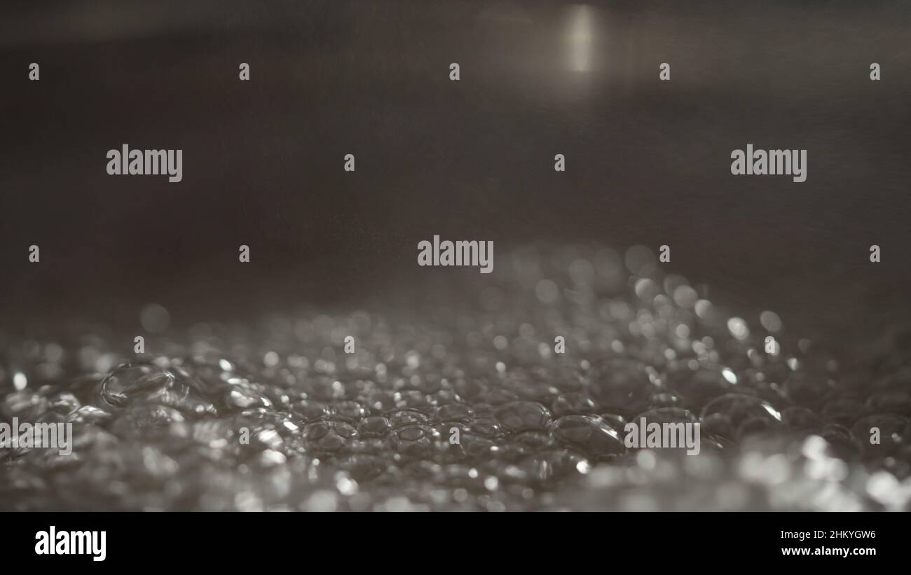 water boiling in pot closeup, wide photo Stock Photo - Alamy